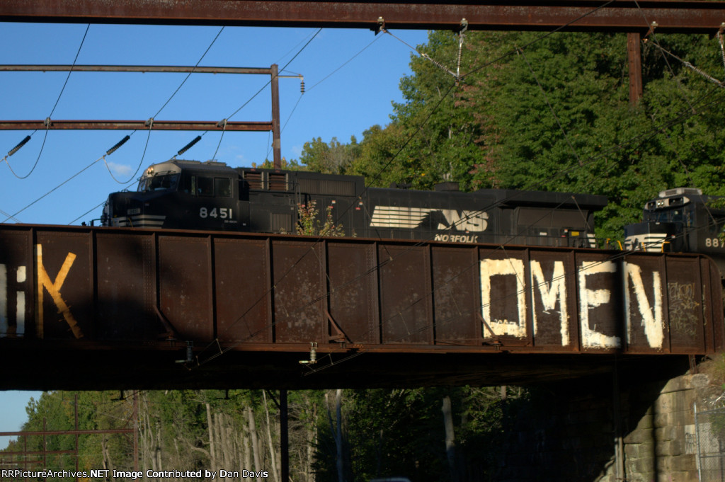 NS C40-8W 8451 leads 17G west towards CP West Lang